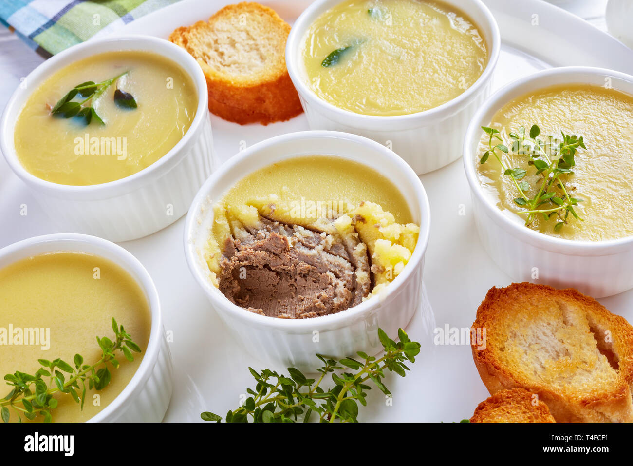 homemade silky-smooth chicken liver pate with herbs and butter in ...