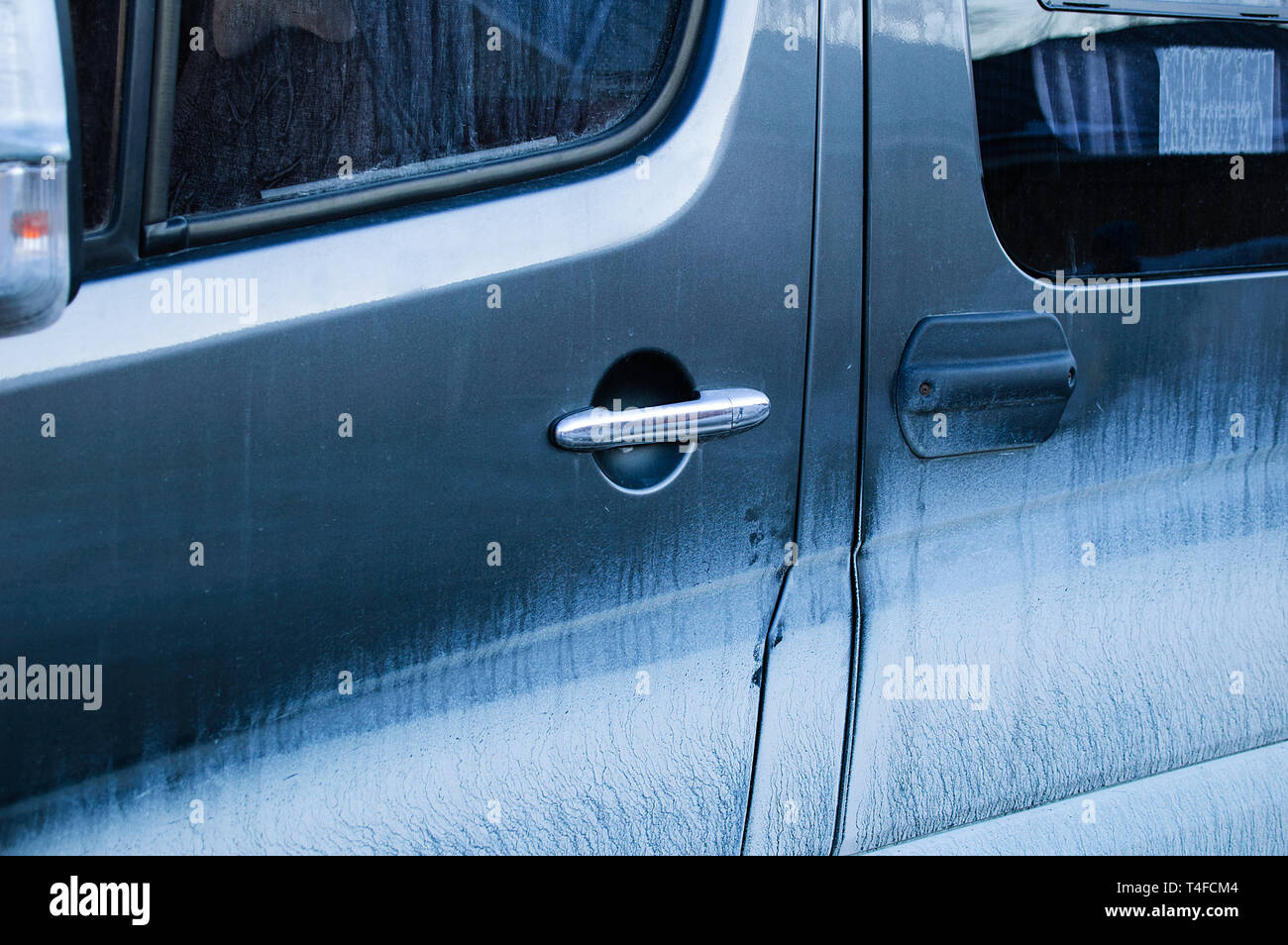 Dirty blue car door. Dirty glass. Dry dirt. Close-up Stock Photo - Alamy