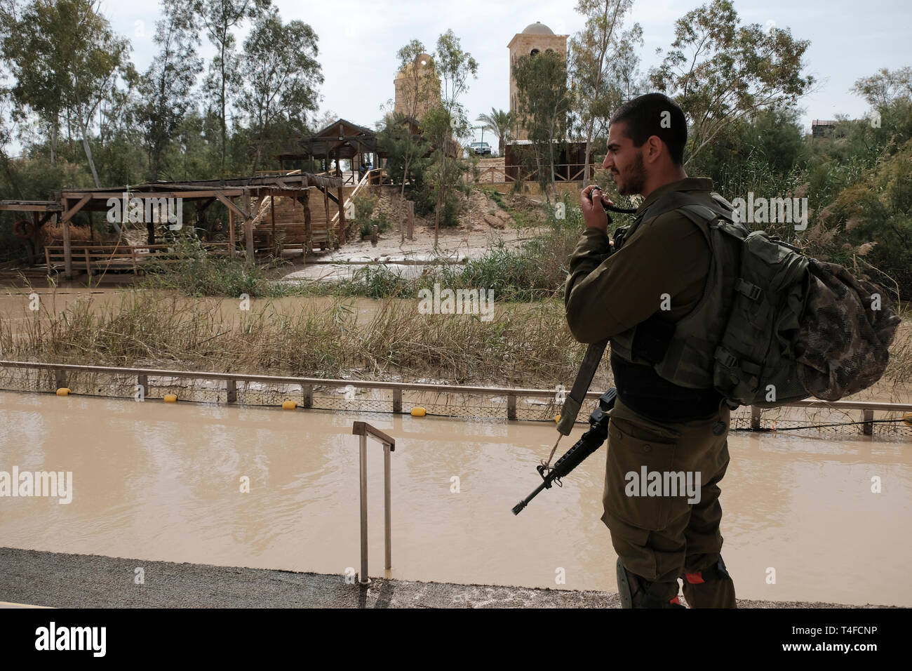 Israeli soldier stands guard at the baptismal site Qaser el Yahud also ...