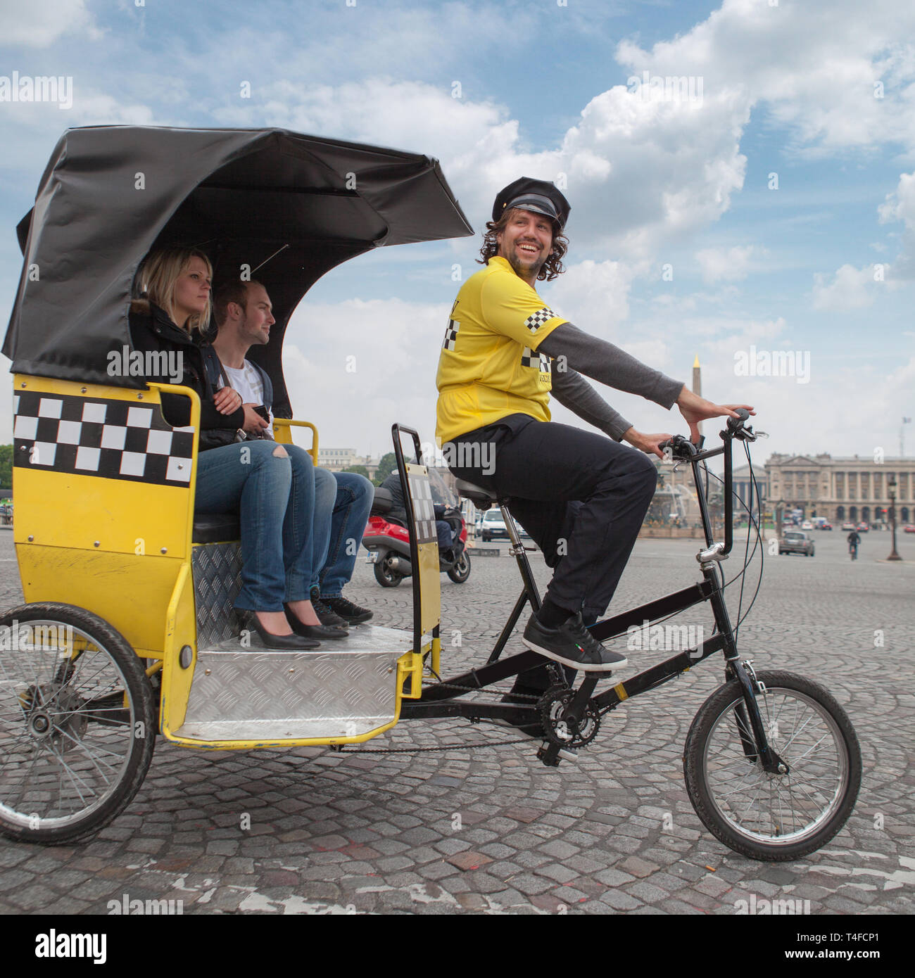 man driving in bicycle taxi Stock Photo - Alamy