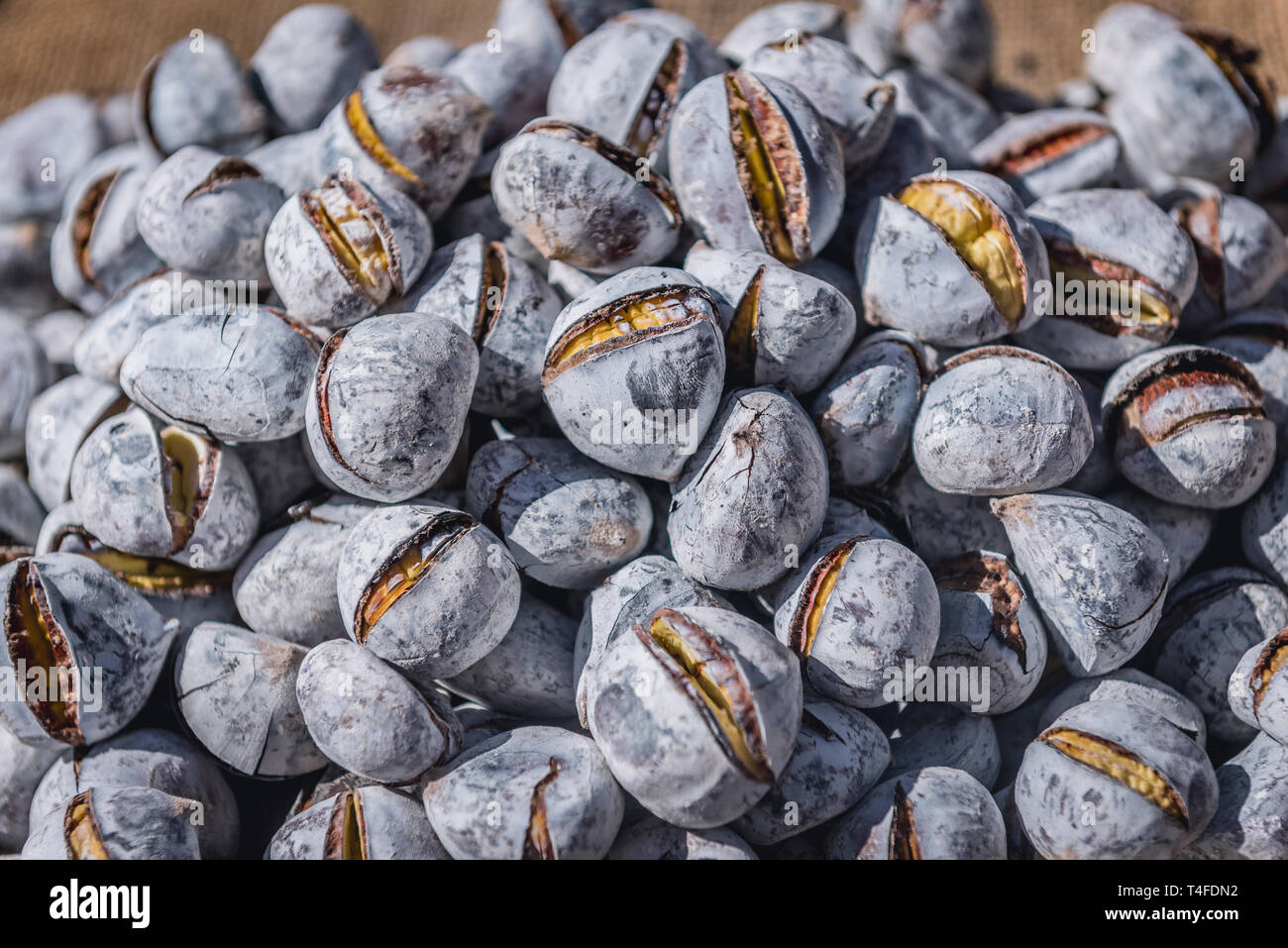 Roasted chestnuts on Rua Augusta pedestrian street in Baixa district of ...