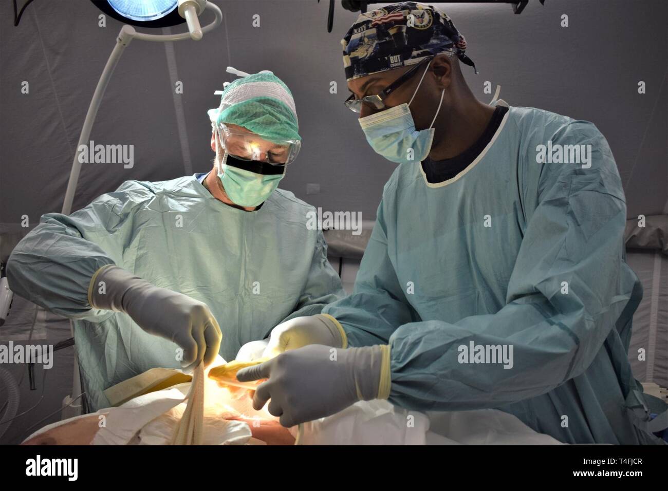 Capt. Martin Stenerös, trauma surgeon, Swedish armed forces (left) and ...