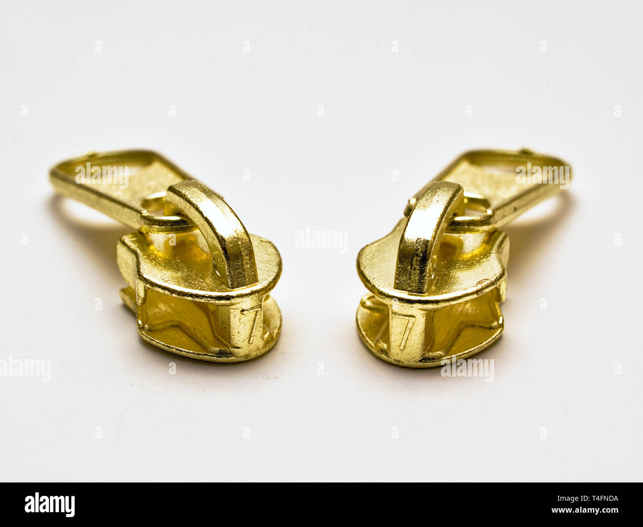 Zipper heads hi-res stock photography and images - Alamy