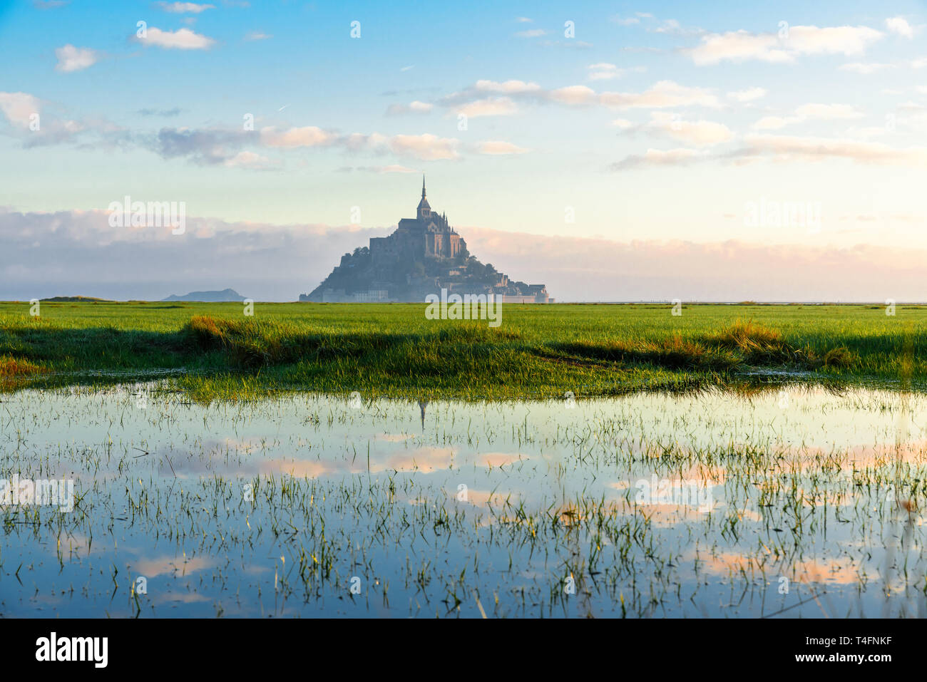 Mont Saint Michel abbey on the island with reflection, Normandy ...