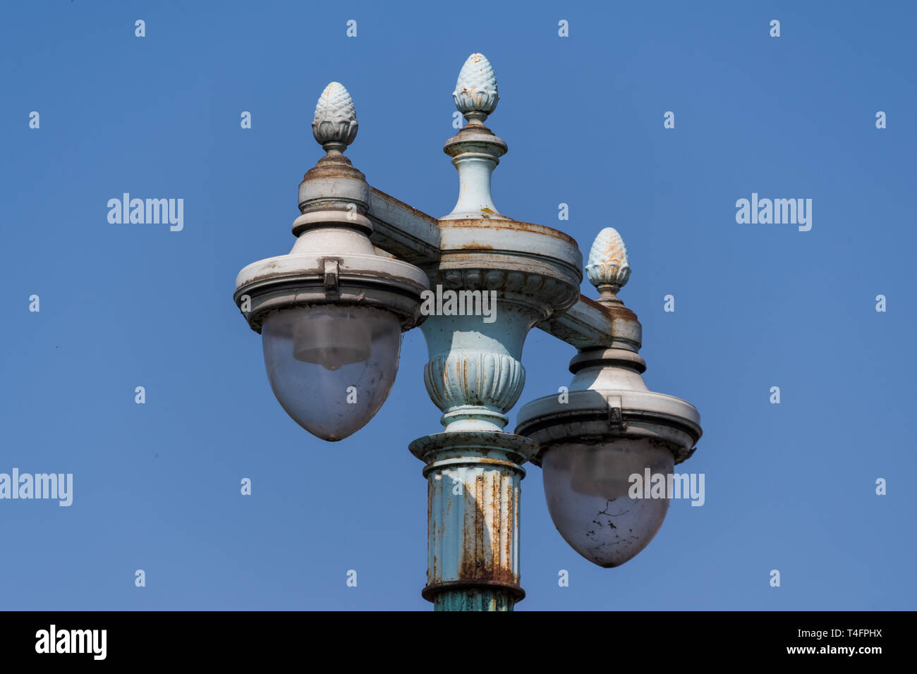The top of an old style lamp post on a sunny day Stock Photo - Alamy
