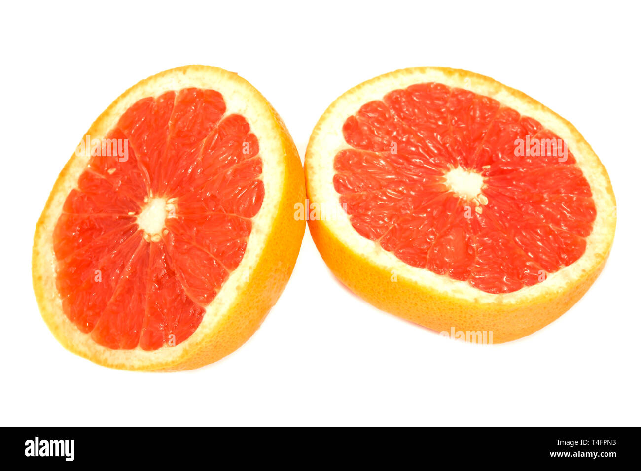 Grapefruit halves isolated on white background Stock Photo - Alamy