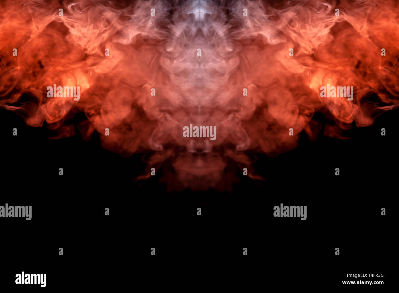 A multi-colored pattern of purple and blue smoke of a mystical shape in ...