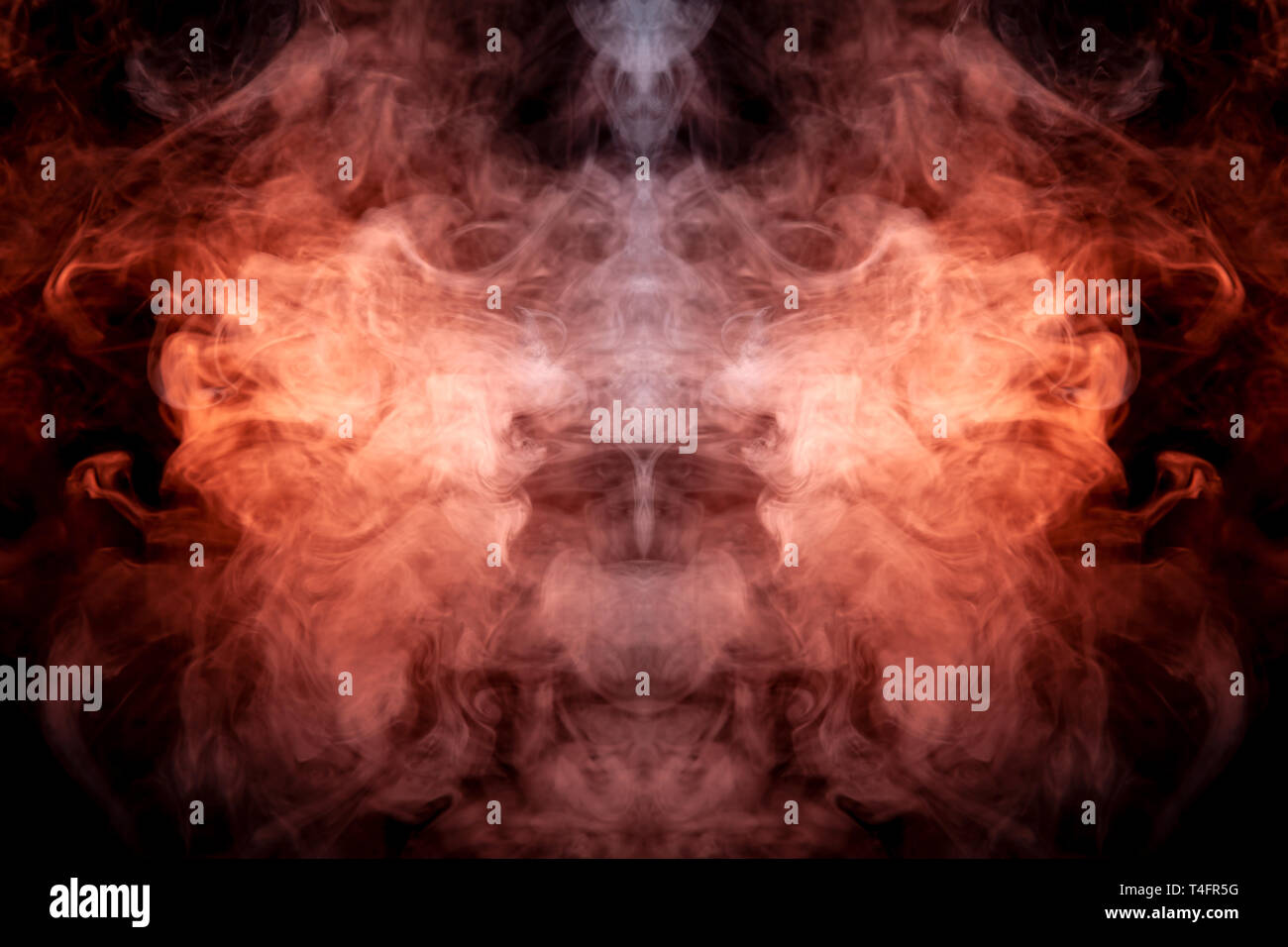 A multi-colored pattern of purple and blue smoke of a mystical shape in ...