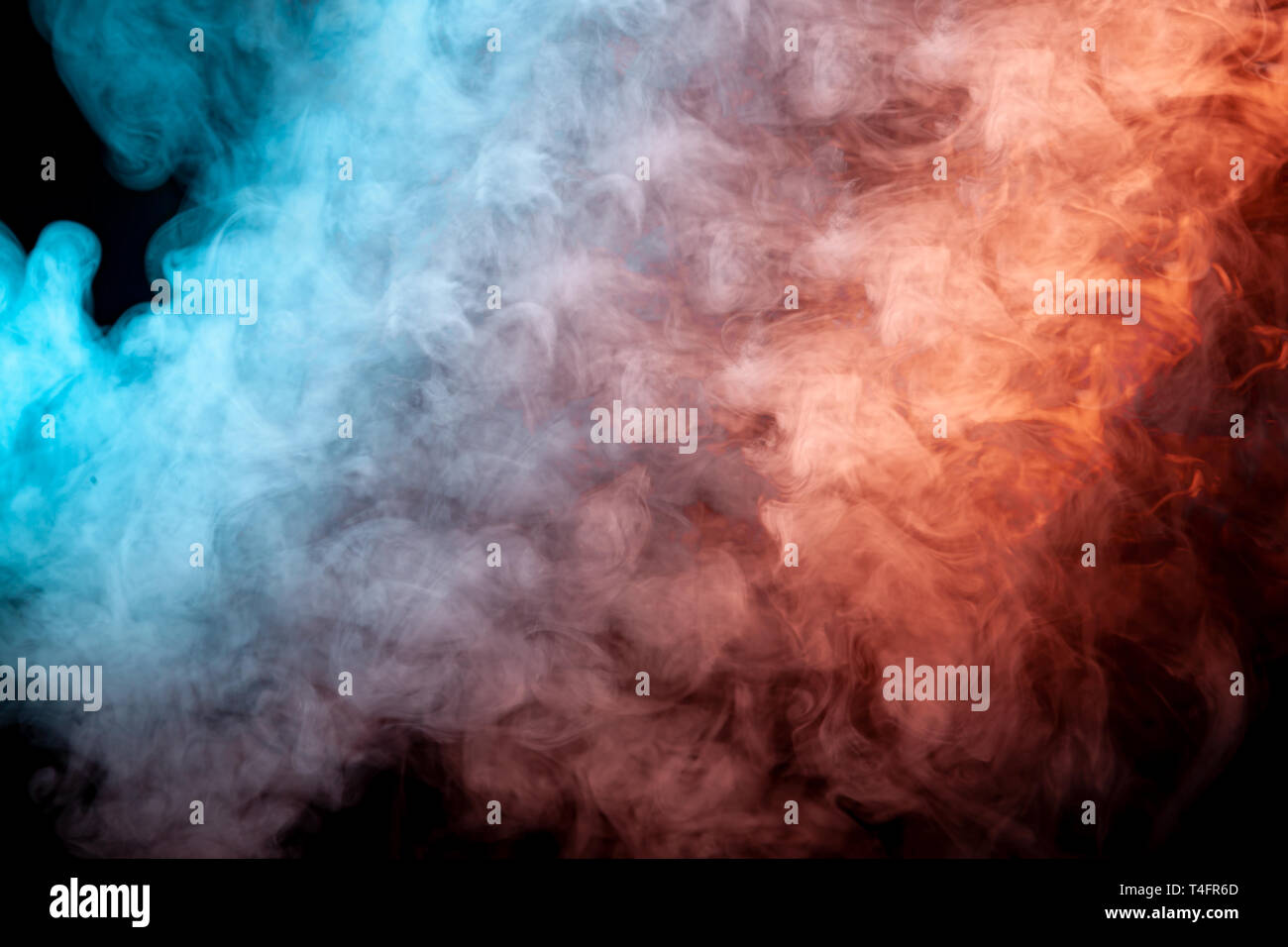 Translucent, thick smoke, illuminated by light against a dark ...