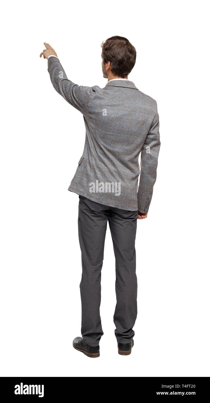 Back view of pointing business man. gesticulating young guy in black ...