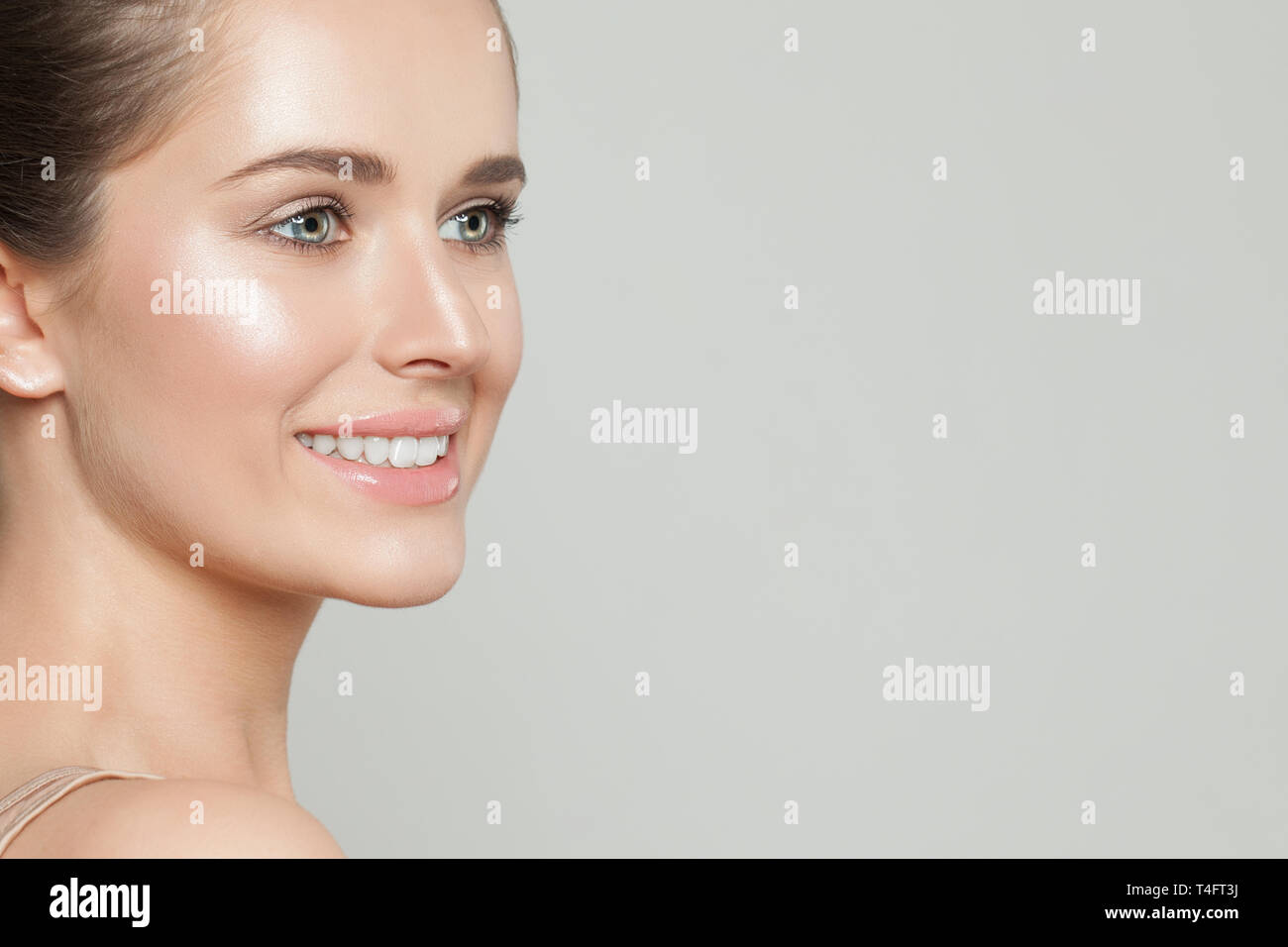 Beautiful woman with clear skin. Skincare and facial treatment Stock ...