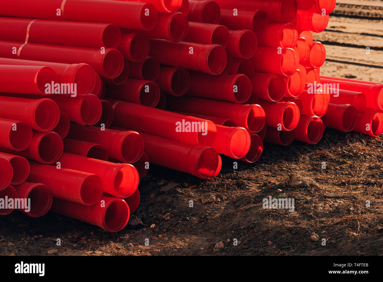 Plastic sewer pipes on construction site for system repairing stacked ...