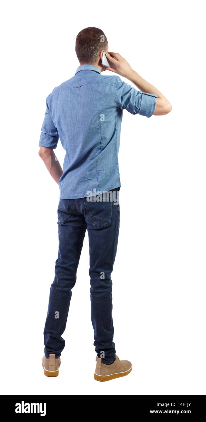 back view of a man talking on the phone. backside view of person. Rear ...