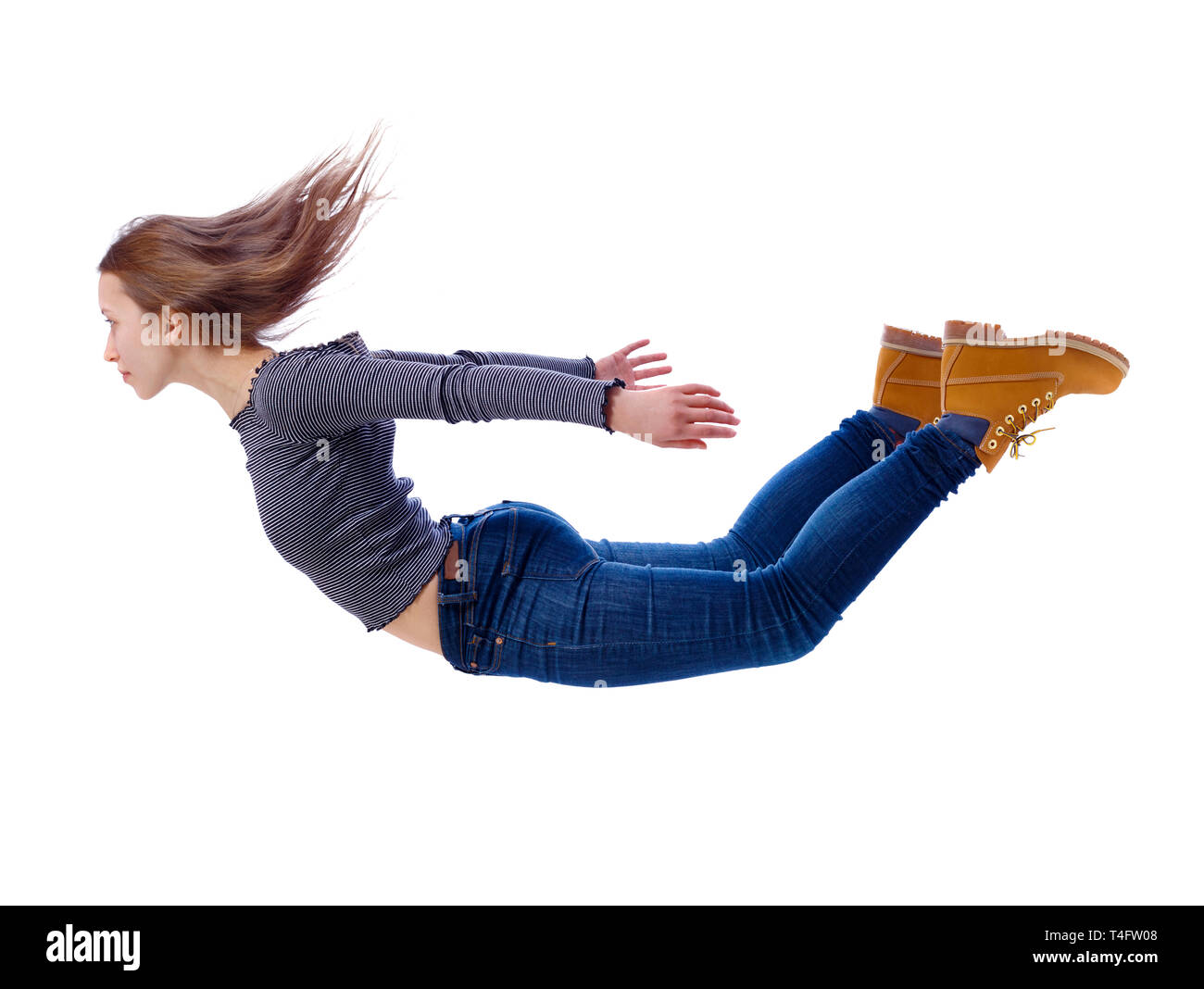 Side view of woman in zero gravity or a fall. girl is flying, falling ...