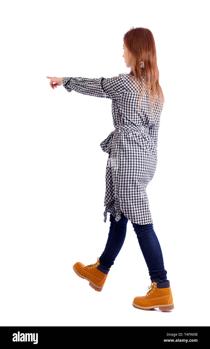 Side view of a girl walking with a pointing hand. going girl showing ...