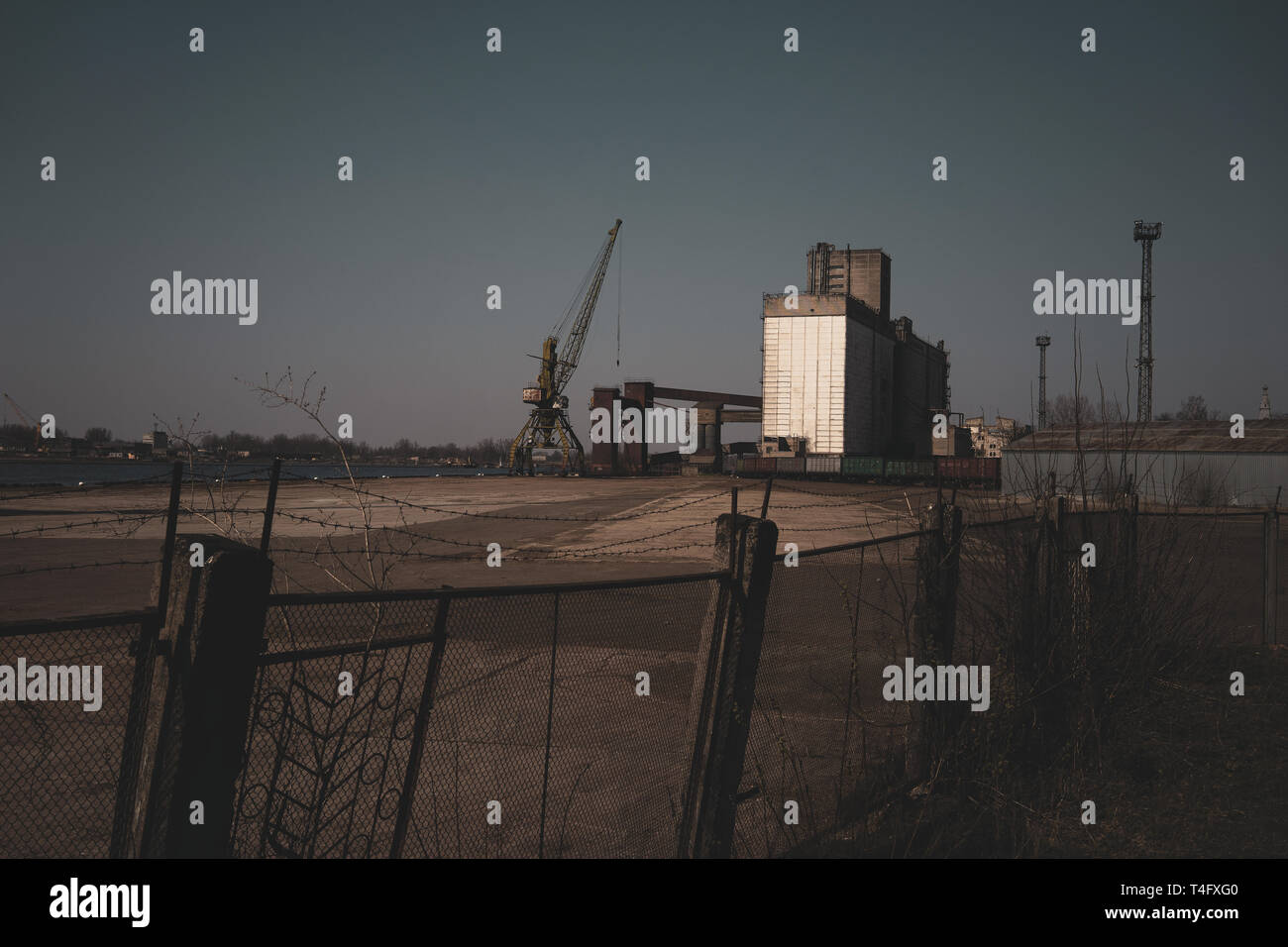 Crane in the closed port in spring Stock Photo - Alamy