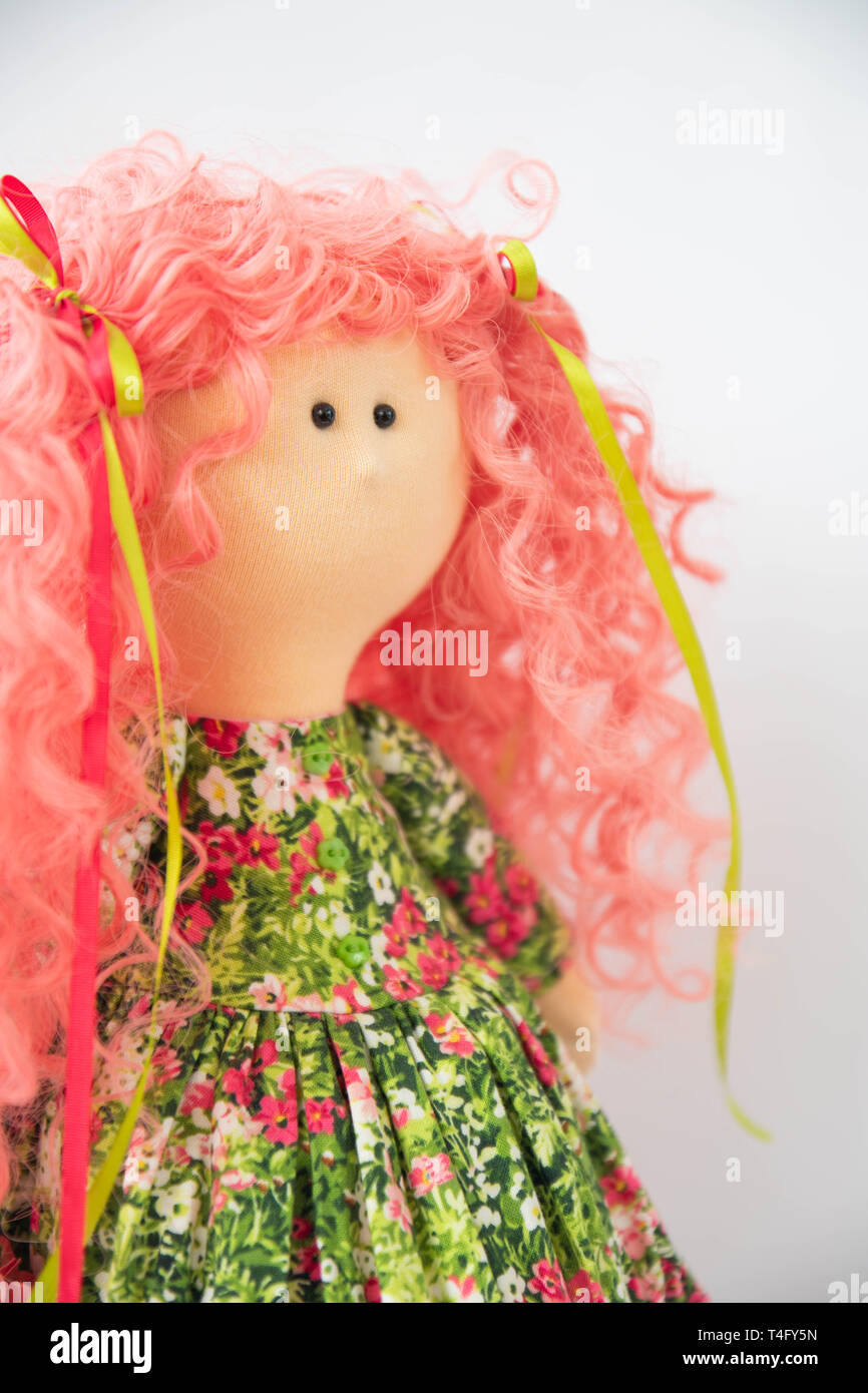 toy rag doll on red background. Art soft focus Stock Photo - Alamy