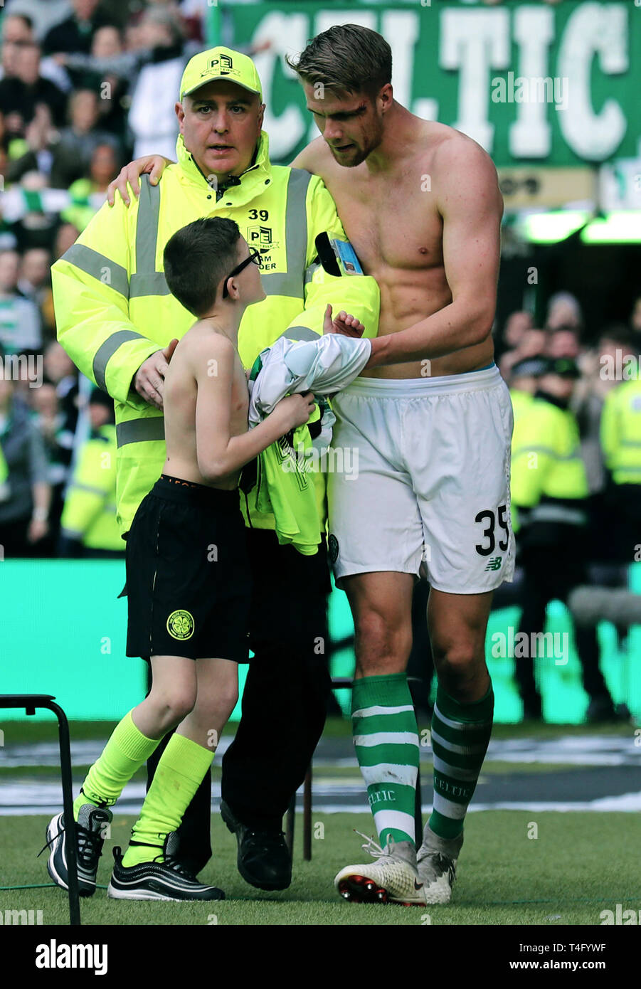 Celtic's Kristoffer Ajer gives his shirt to a young fan Stock Photo - Alamy