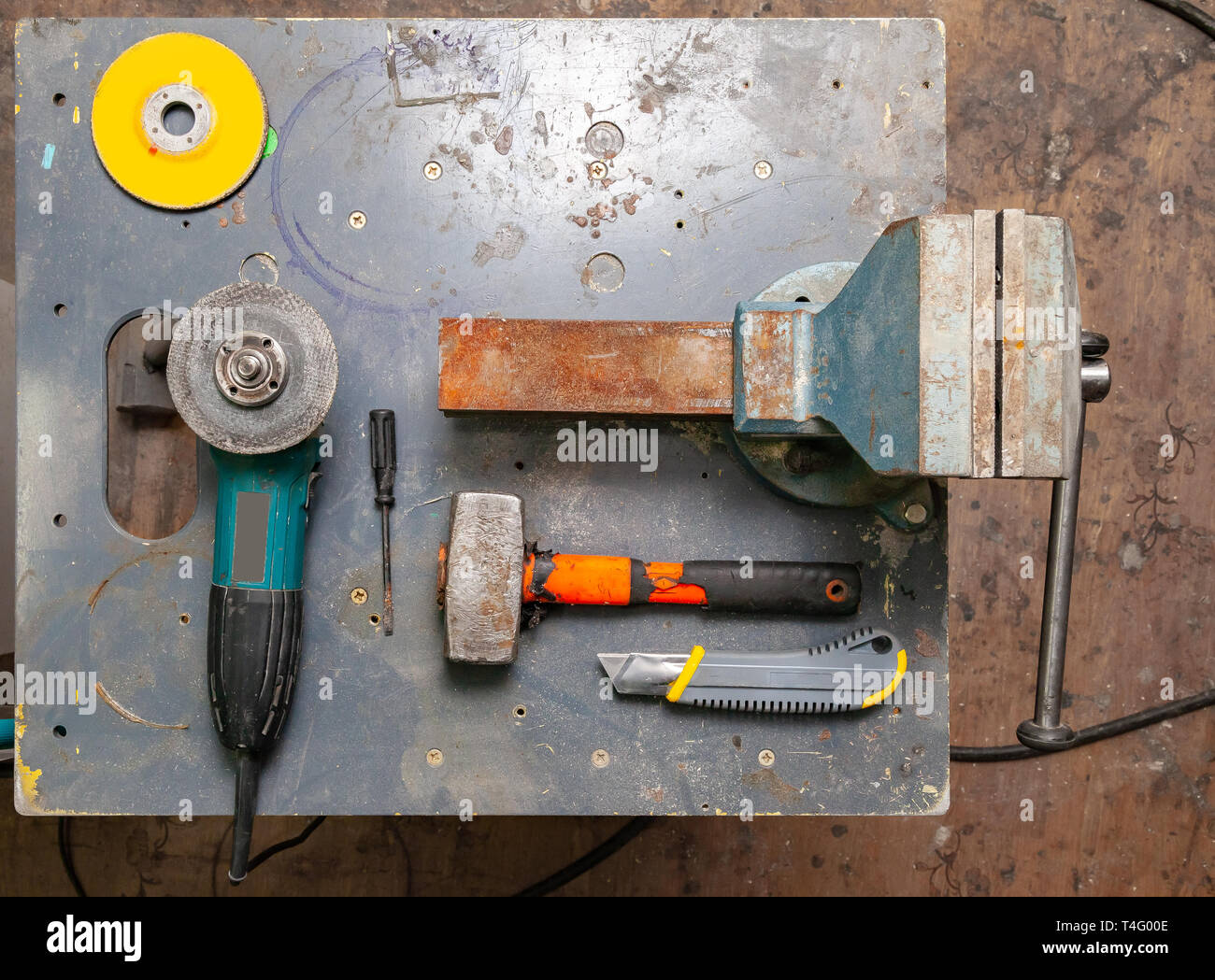 Flat lay view of a workbench with a set of tools consisting of a large ...