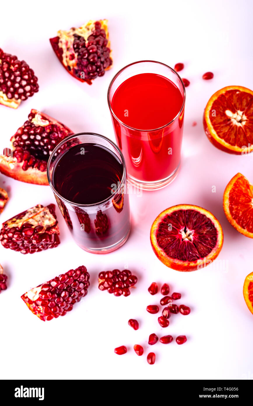Set of healthy fresh red color drinks on the white background. Raw ...