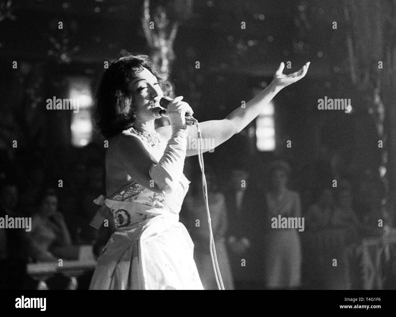 Singer Josephine Baker performs at the Madame-Ball, the first big event ...