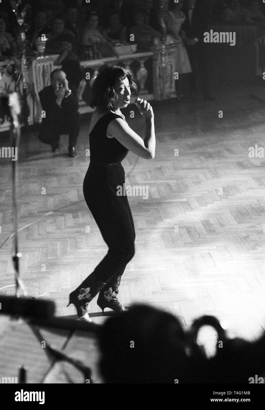 Singer Josephine Baker performs at the Madame-Ball, the first big event ...