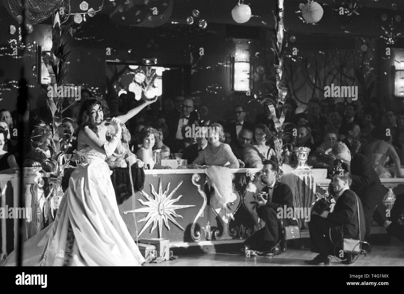 Singer Josephine Baker performs at the Madame-Ball, the first big event ...