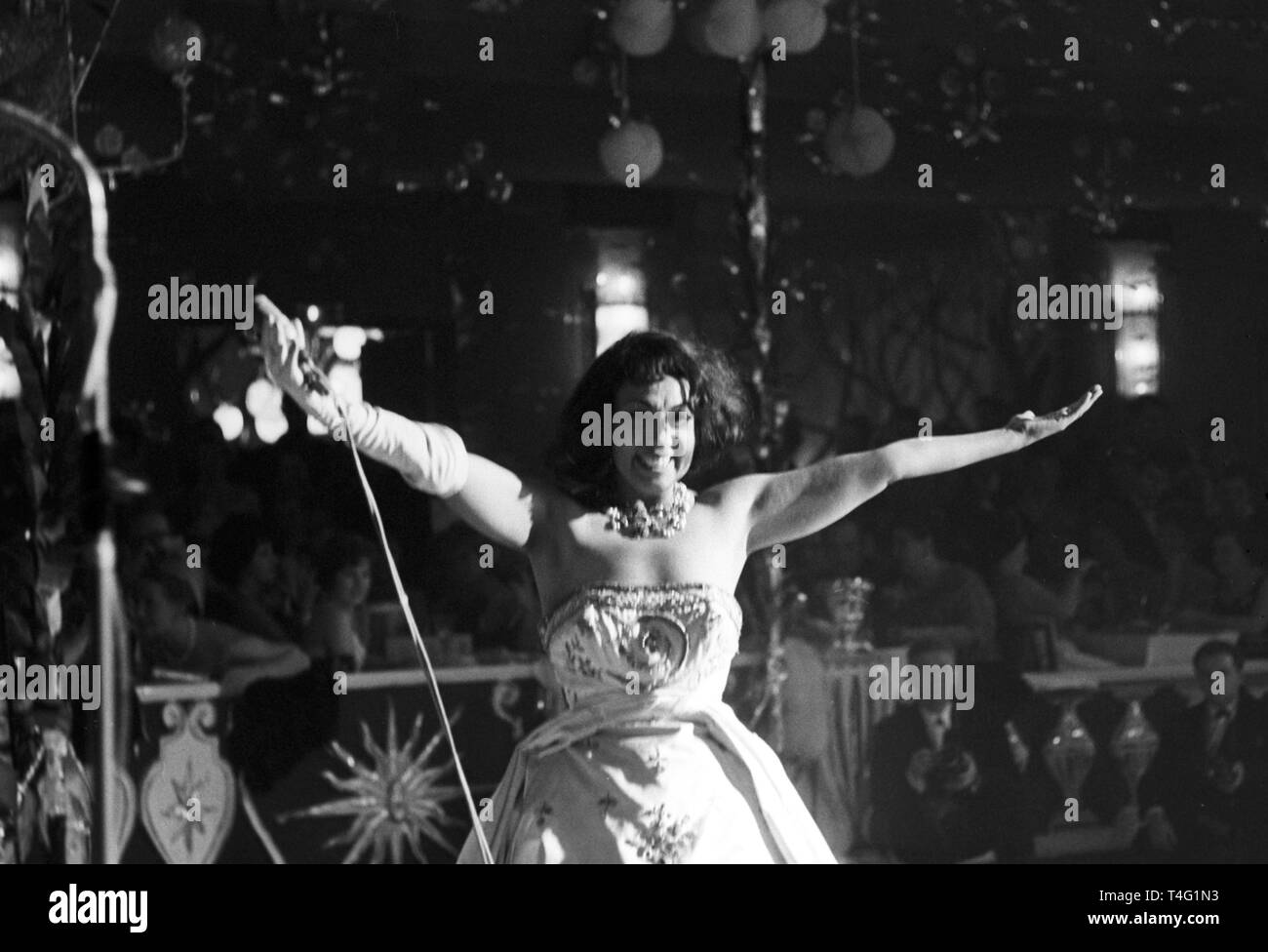 Singer Josephine Baker performs at the Madame-Ball, the first big event ...