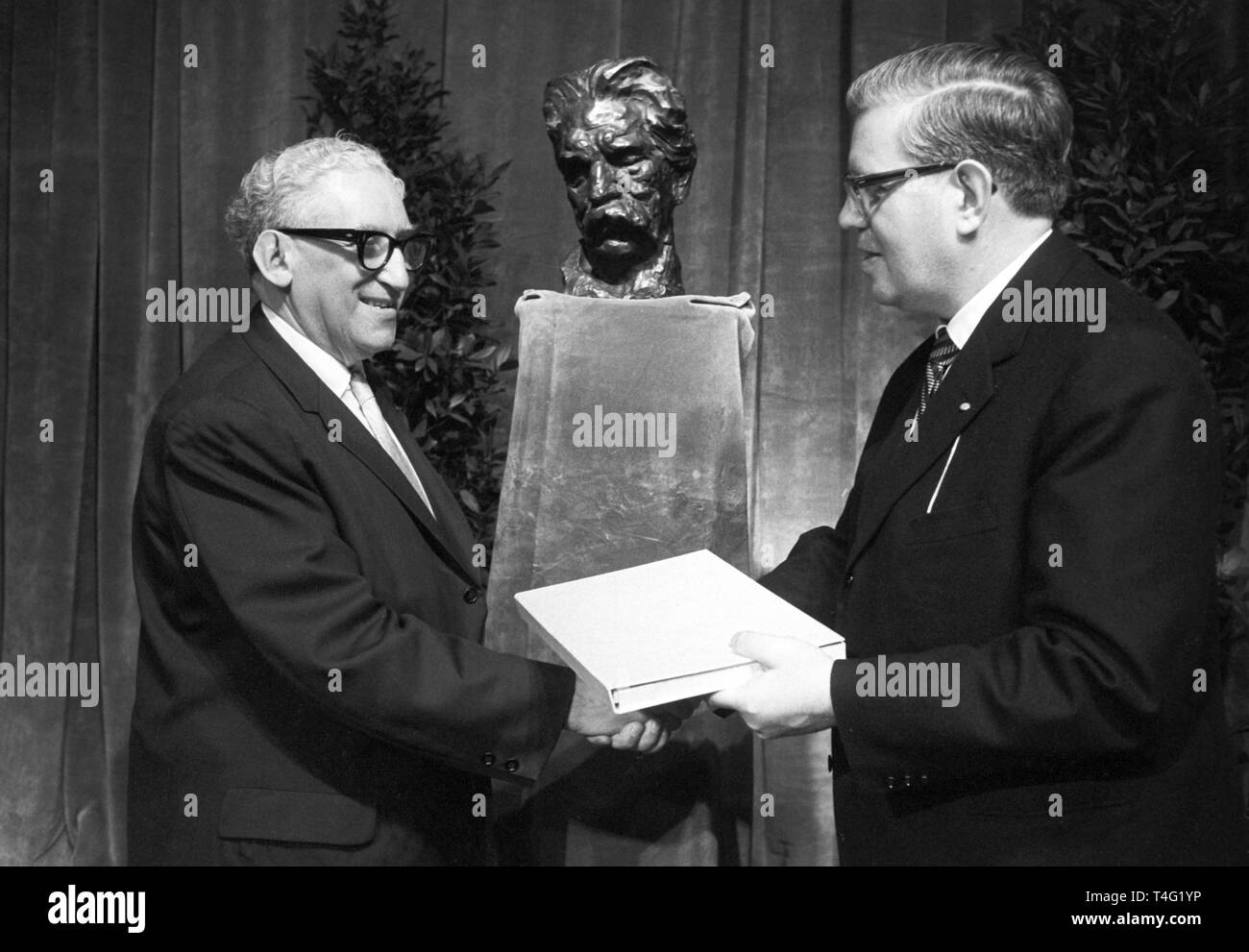 Writer Kurt R. Großmann (l) receives the Albert-Schweitzer Book Price ...