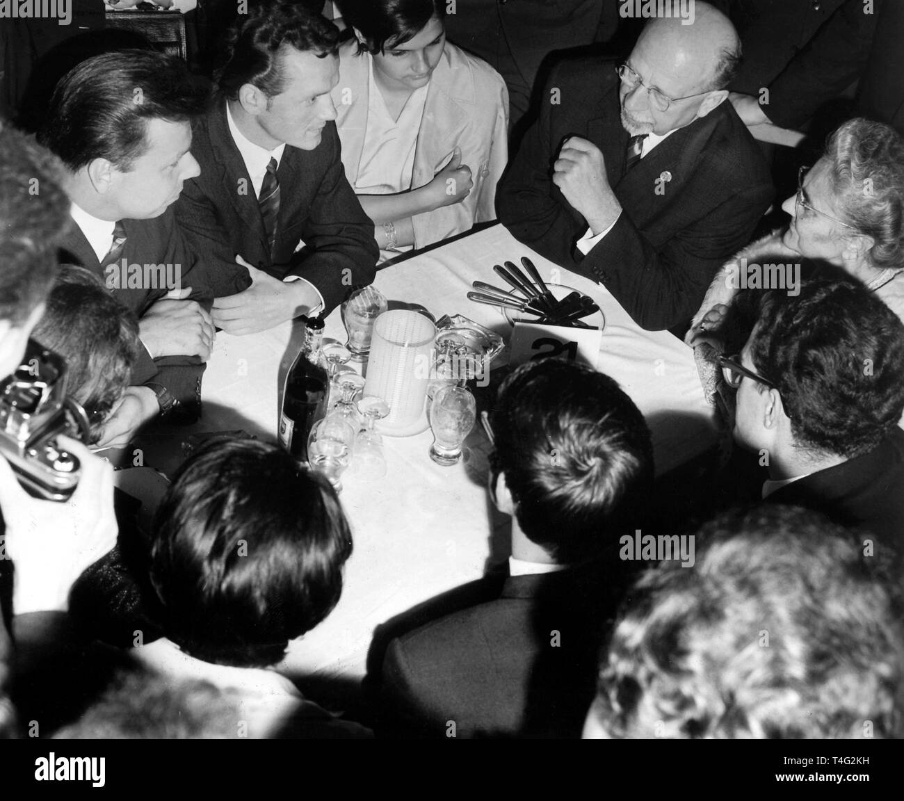 GDR leader Walter Ulbricht (top R) chats with guests to a ball in ...