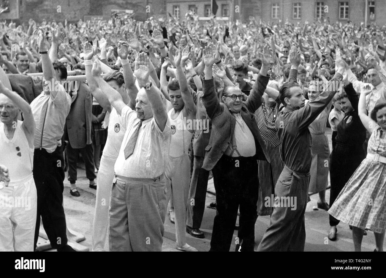 GDR leader Walter Ulbricht (C) participates in a collective gymnastic ...