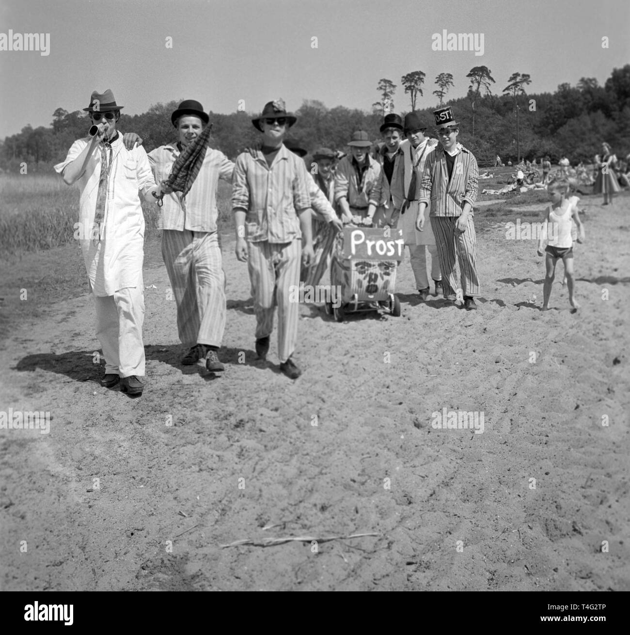 While being dressed up, a group of men makes party on Father's Day on ...