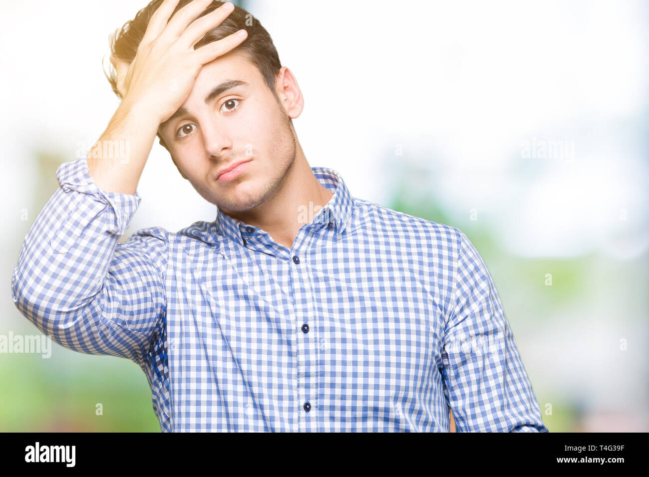 Young handsome business man over isolated background surprised with ...