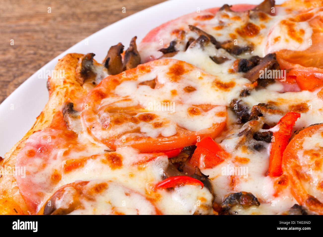 Pizza with ham and cheese Stock Photo - Alamy