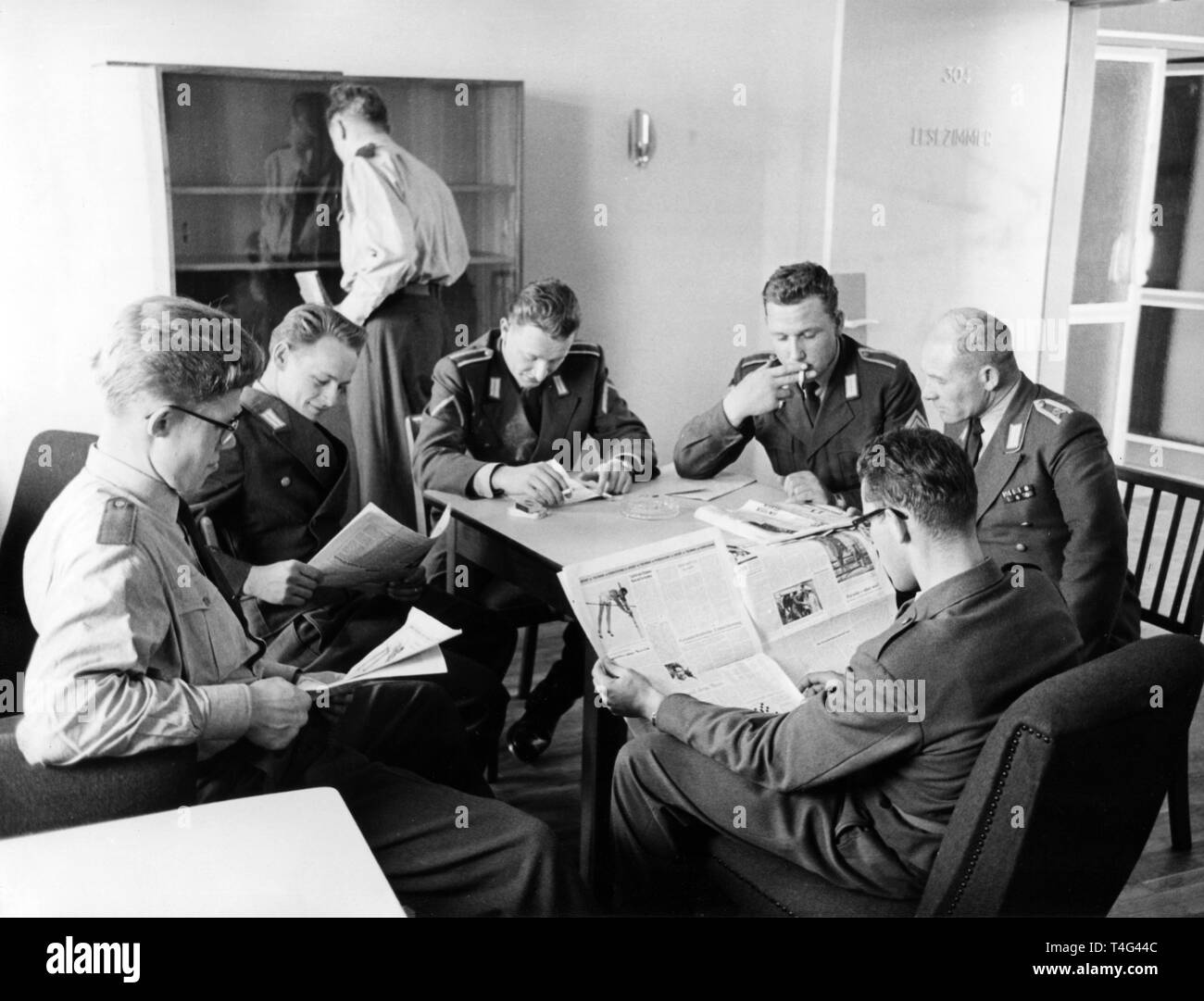 Soldiers of the German armed forces - Bundeswehr - reading the paper in ...