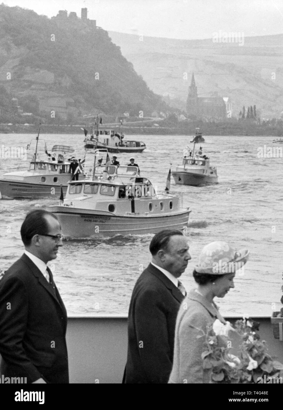 Queen Elizabeth II and Prime Minister Peter Altmeier (center) are ...
