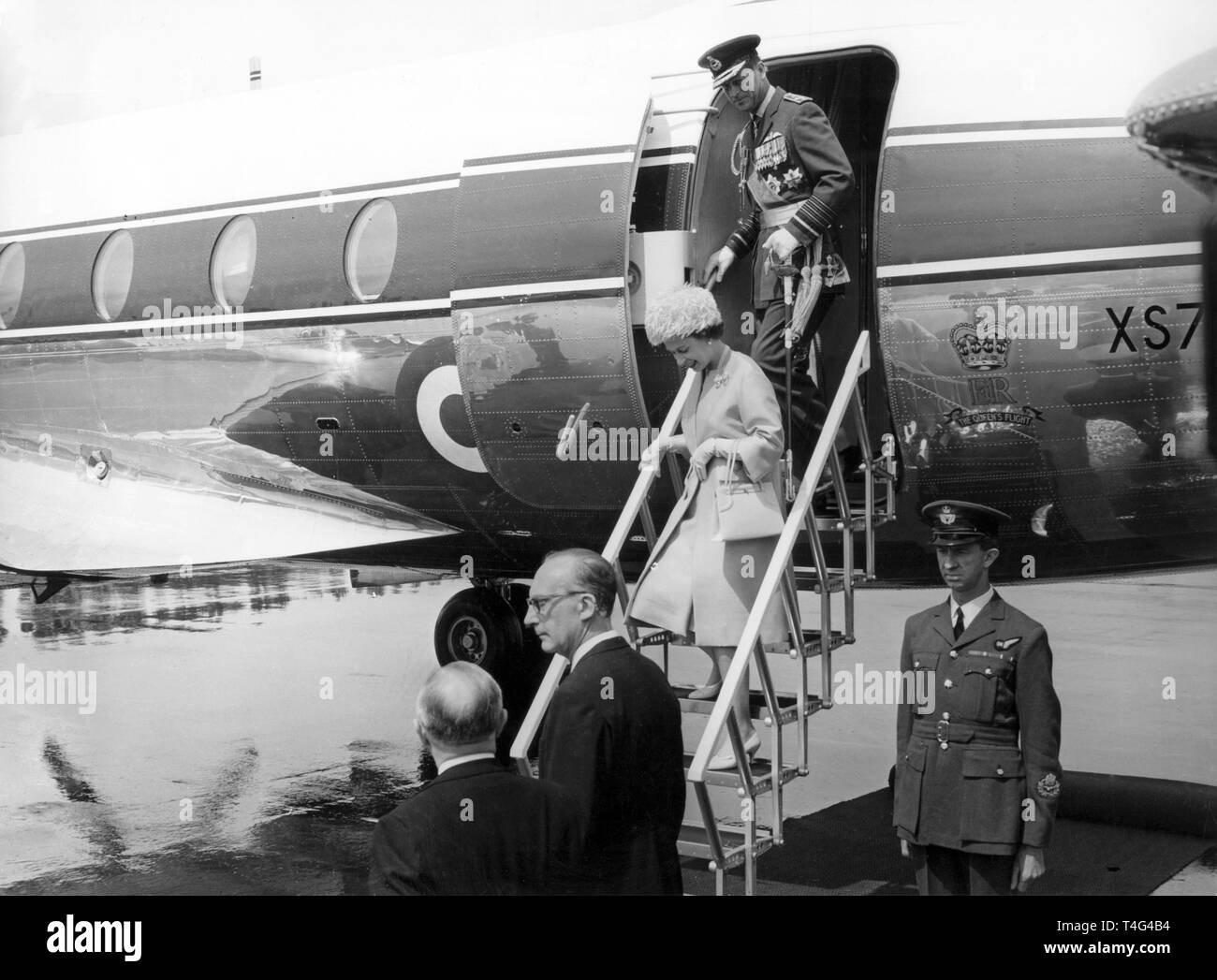 Queen Elizabeth II. and her husband Prince Philip arrive at airport ...
