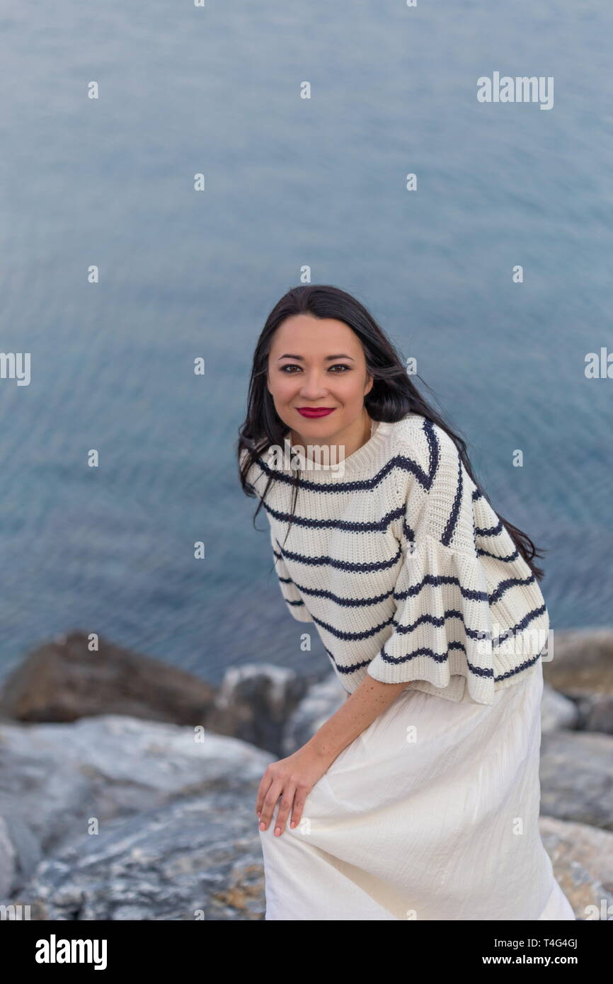 Romantic portrait of a female in a nautical style clothes Stock Photo ...