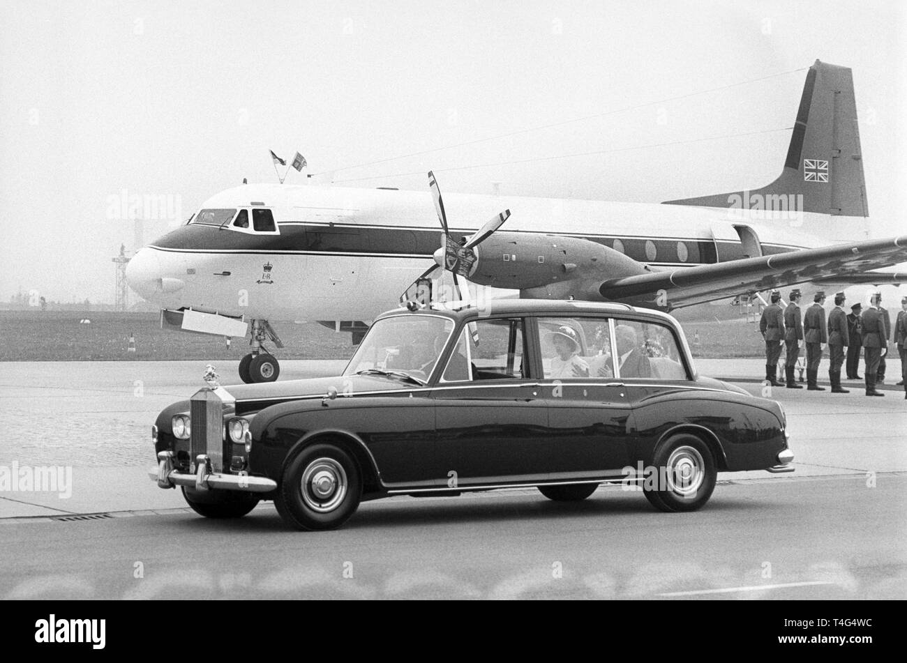 Queen Elizabeth is driving to the next station of her trip after ...