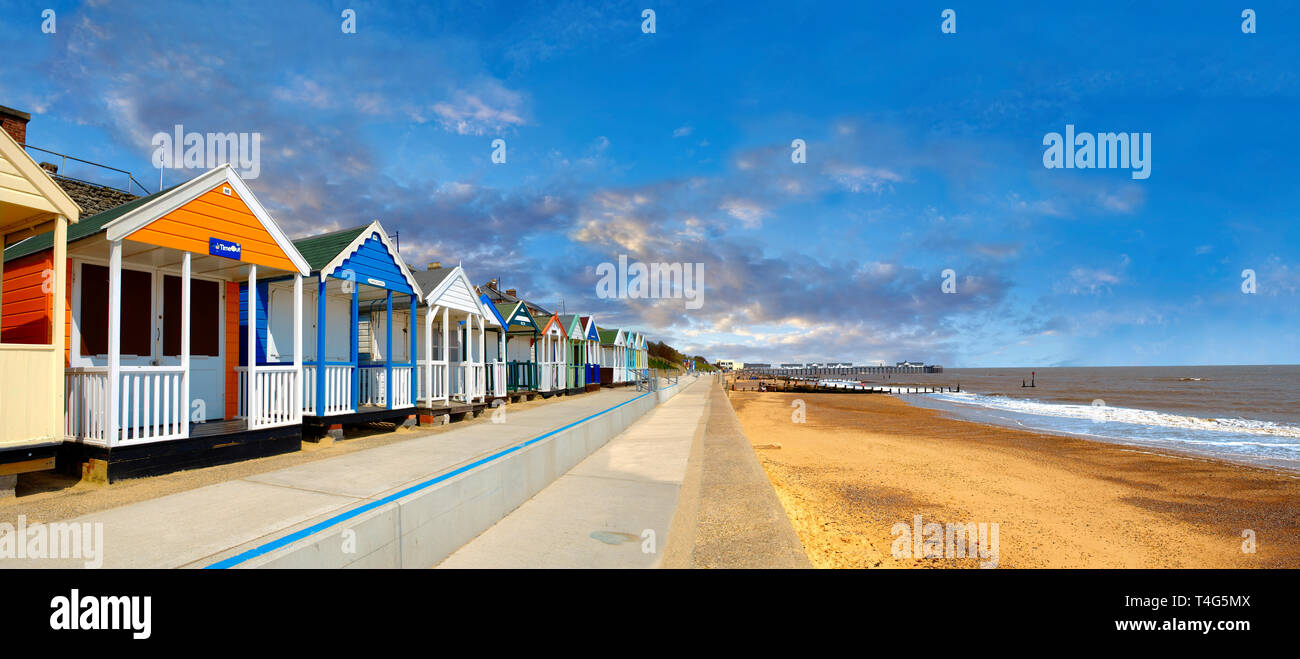 Traditional seaside colorful beach huts on the beachof Southwold ...