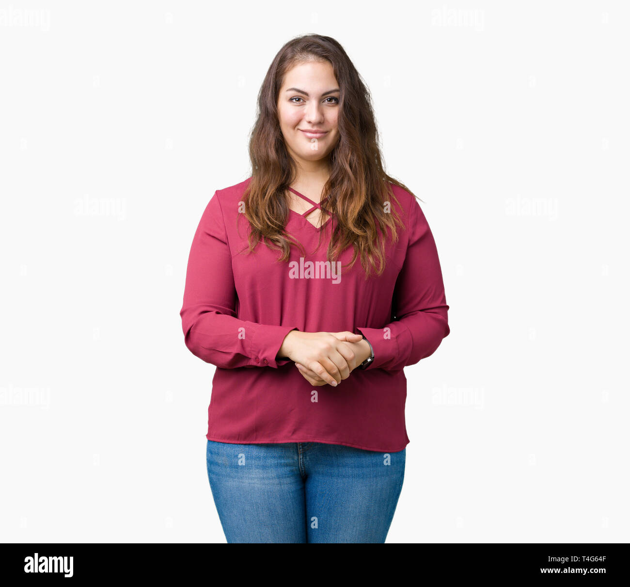 Beautiful plus size young woman over isolated background Hands together ...