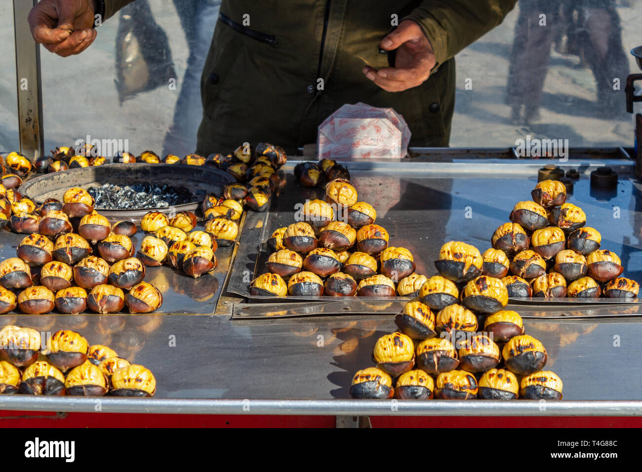 Turkish street food, roasting chestnut grill Stock Photo - Alamy