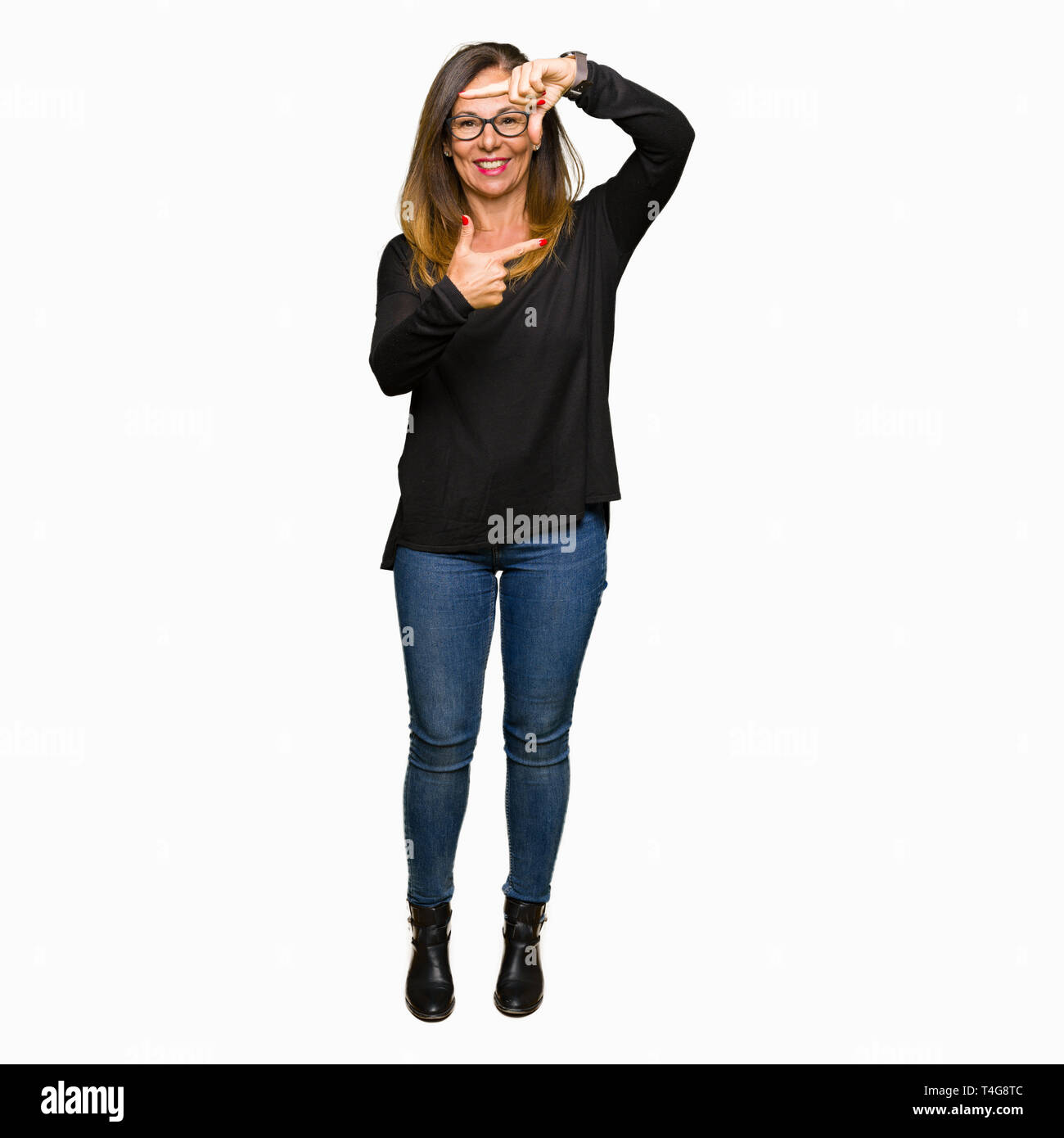 Woman framing face hands smiling Cut Out Stock Images & Pictures - Alamy