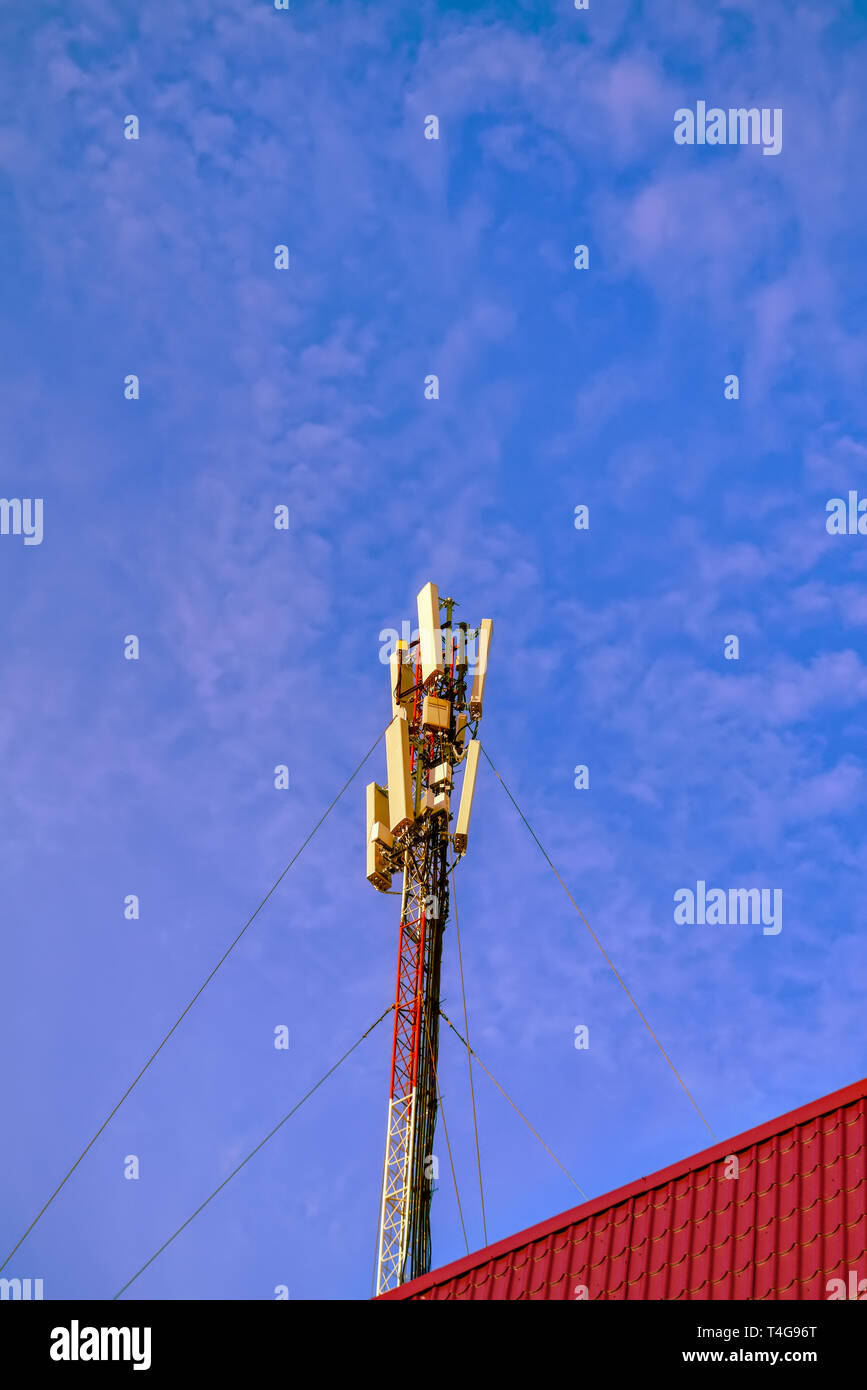 Tower with telecommunications equipment against the sky Stock Photo - Alamy