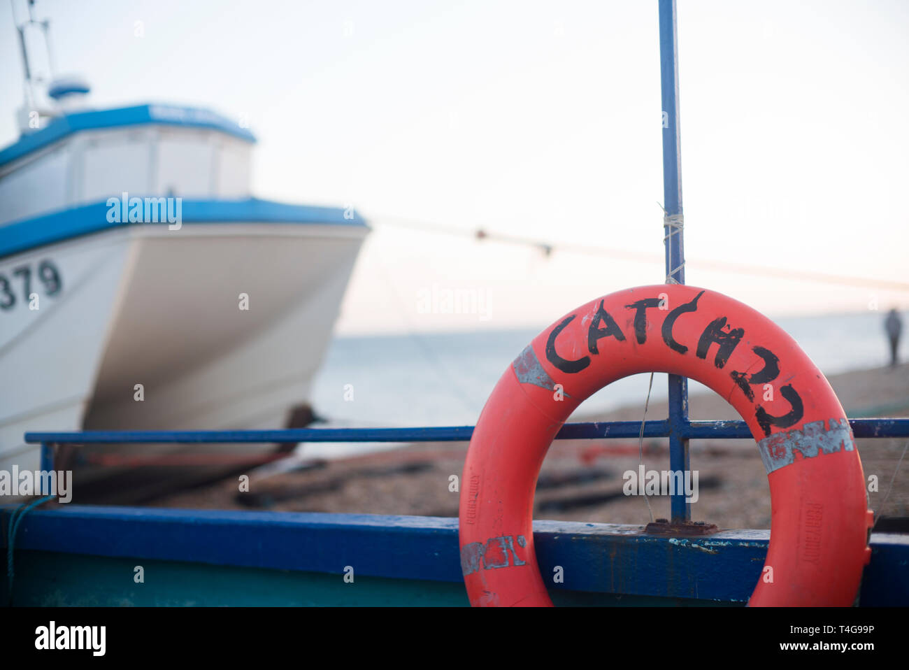 Catch 22 buoy on a boat Stock Photo - Alamy