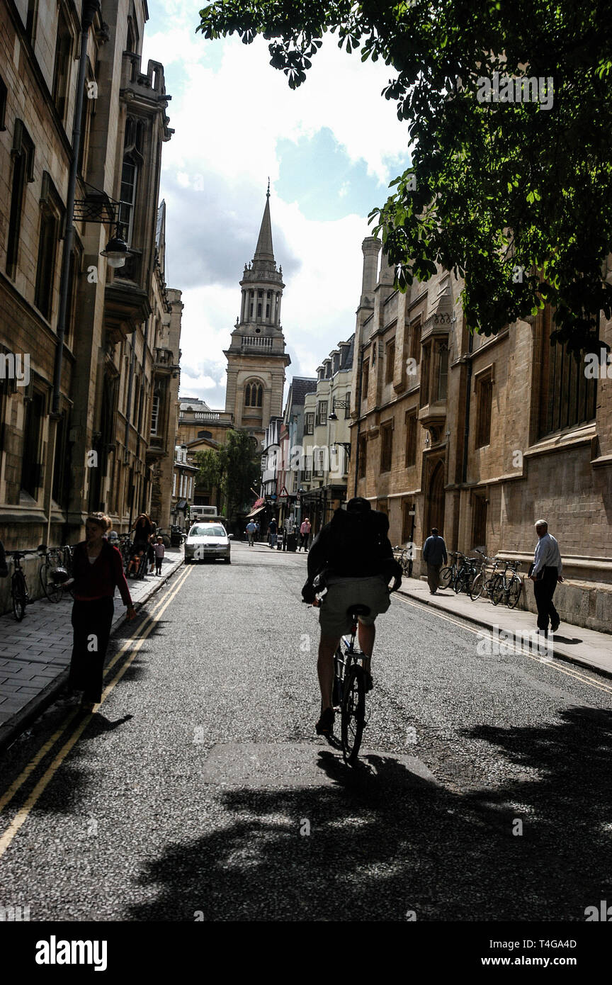An Oxford student cycling along Turl Street, between Exeter College on ...