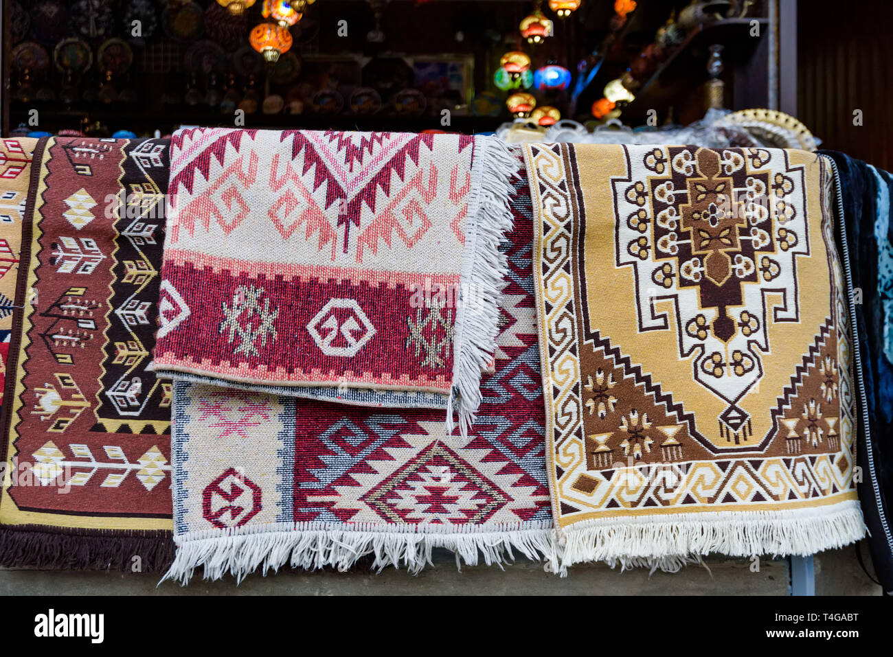 Hand made carpets hanging in street market Stock Photo - Alamy