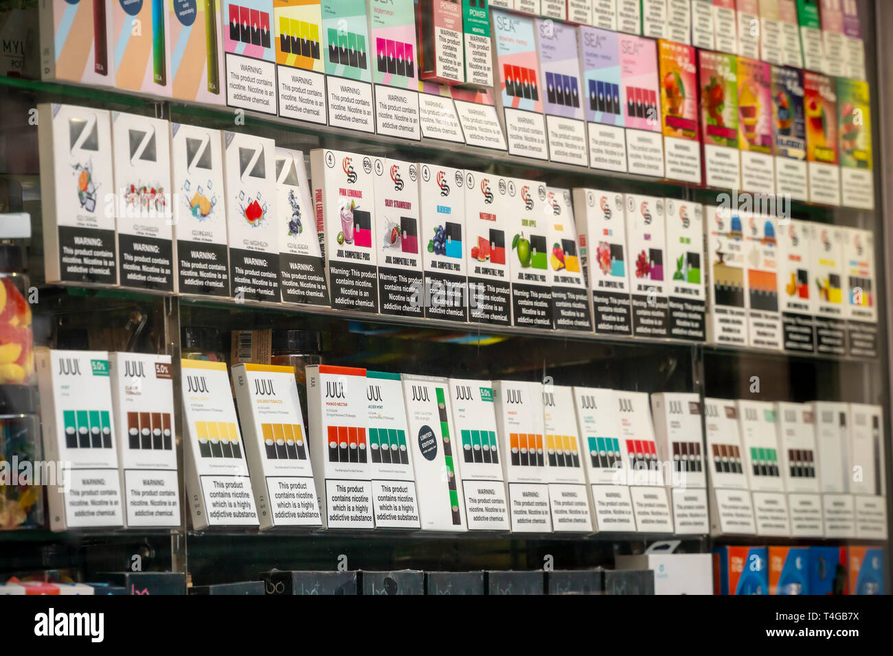 A selection of the popular Juul brand vaping supplies and third-party ...