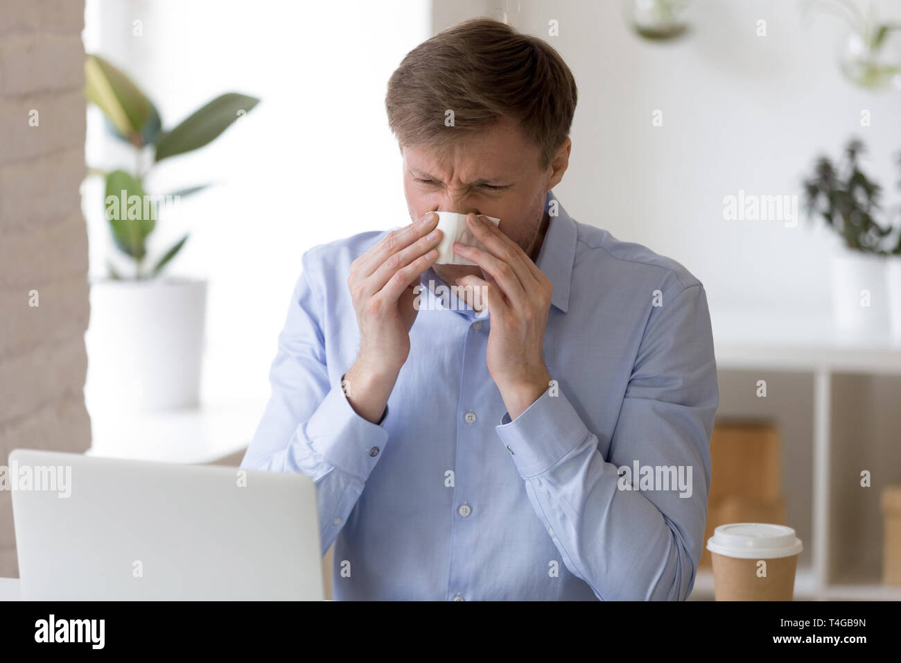 Sneeze office hi-res stock photography and images - Alamy