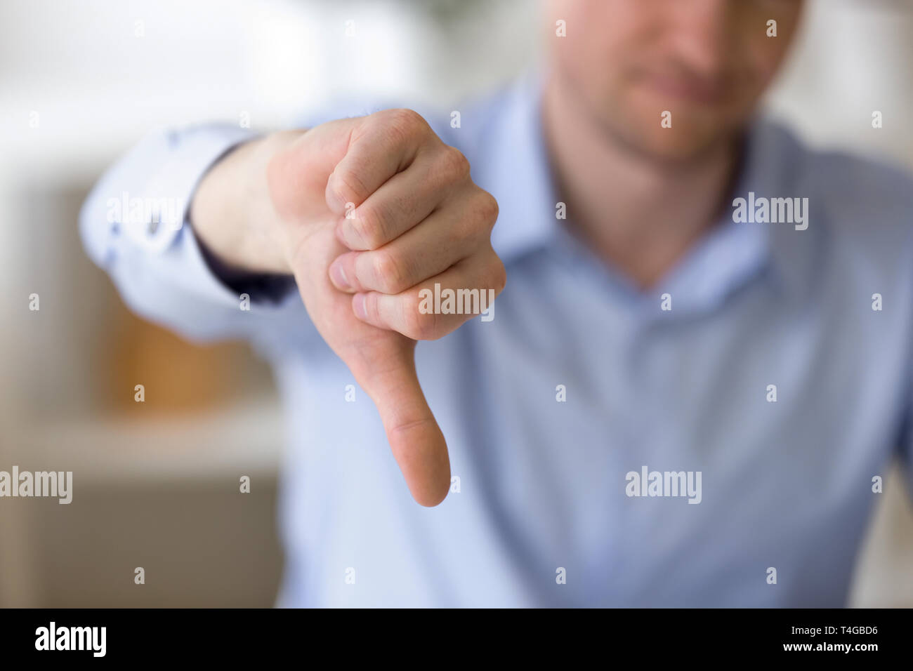 Businessman thumbs down hi-res stock photography and images - Alamy